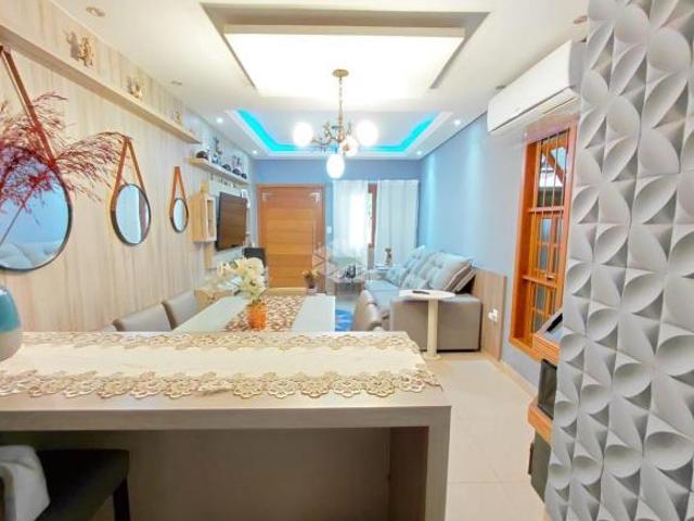 Casa em Alvorada 2 suítes,Piscina Aquecida e vaga de garagem coberta.