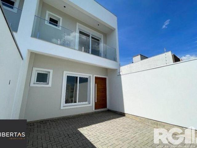 Casa em bairro planejado de Canoas com excelência em beleza e qualidade