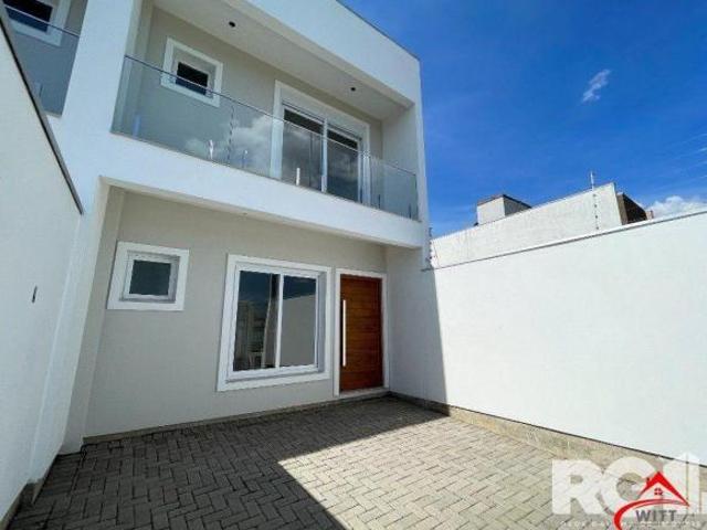 Casa em bairro planejado de Canoas com excelência em beleza e qualidade