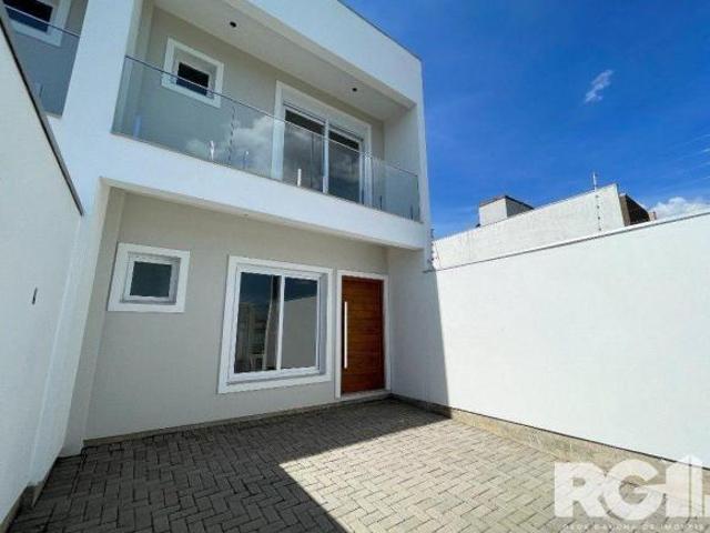 Casa em bairro planejado de Canoas com excelência em beleza e qualidade