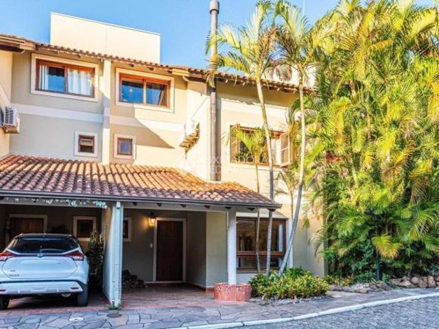 Casa em condomínio 3 dormitórios 179m2 privativos 2 vagas de garagem no bairro Tristeza