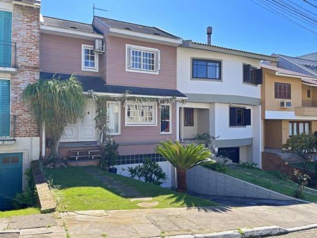 Casa em Condomínio 3 dormitórios à venda Vila Nova Porto Alegre/RS