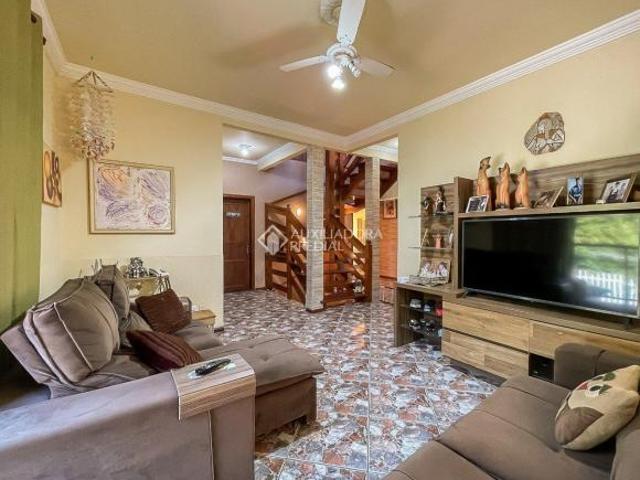 Casa em Condomínio 3 dormitórios bairro Vila Nova em Porto Alegre