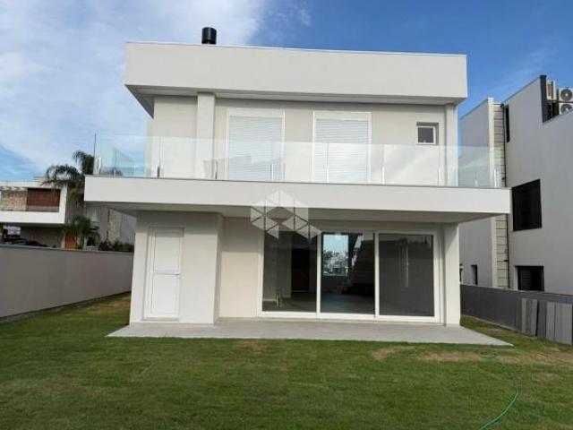 CASA EM CONDOMINIO 3 DORMITORIOS E 3 SUÍTES, 4 VAGAS DE GARAGEM, LAREIRA, CHURRASQUEIRA, SACADA, PI