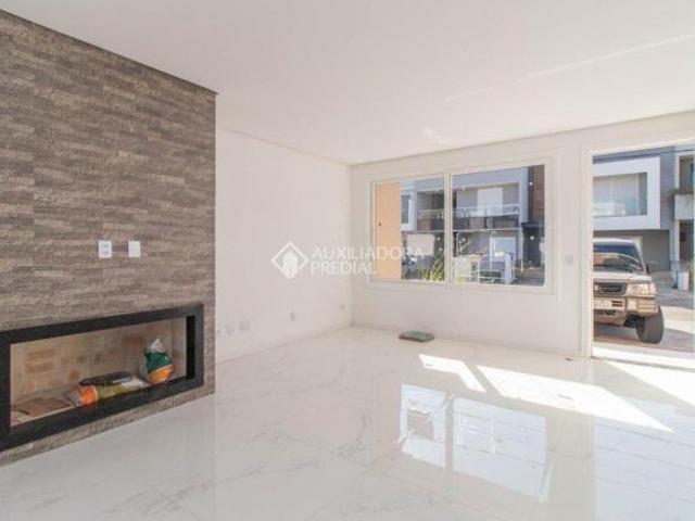 Casa em condomínio 162m² no Aberta dos Morros com 3 suítes e pátio