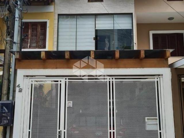 Casa em Condomínio 2 dormitórios 1 suíte no bairro Hípica Porto Alegre