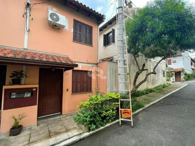 Casa em Condomínio 2 dormitórios 1 vaga no Bairro Vila Nova