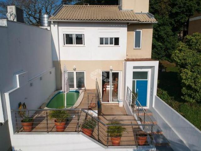 Casa em condomínio 2 dormitórios no Cinque Terre Vila Nova/ Porto Alegre