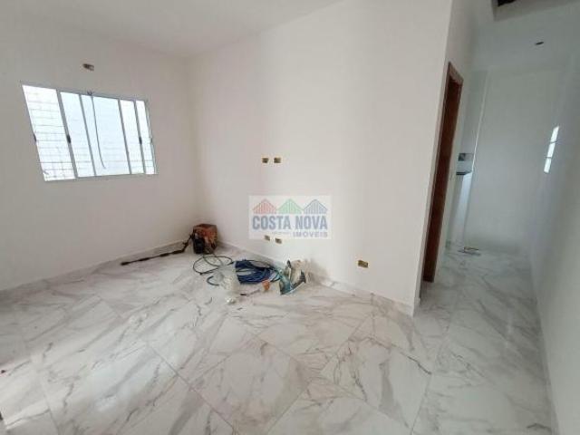 Casa em Condomínio 2 dormitórios sendo 1 suíte, 1 vaga no bairro Tude Bastos em Praia Grande
