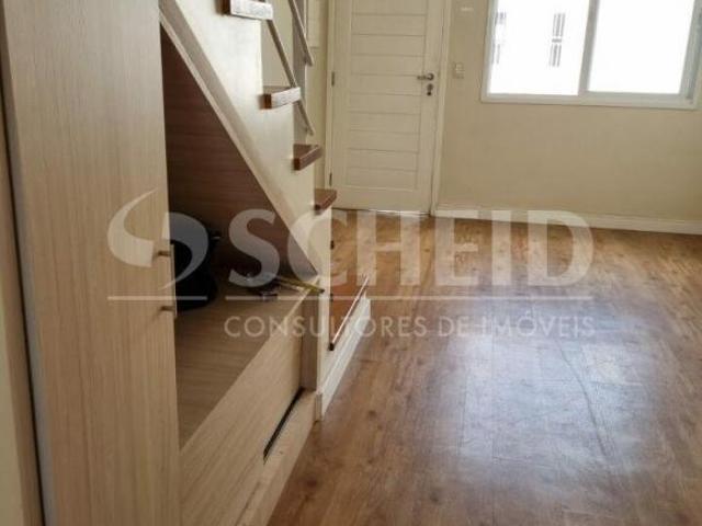 CASA EM CONDOMÍNIO, 2 DORMS 2 VAGAS QUINTAL COM CHURRASQUEIRA