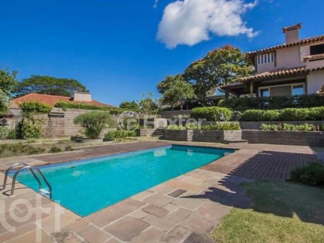 Casa em Condomínio, 7 dormitórios, 830 m², em Cavalhada