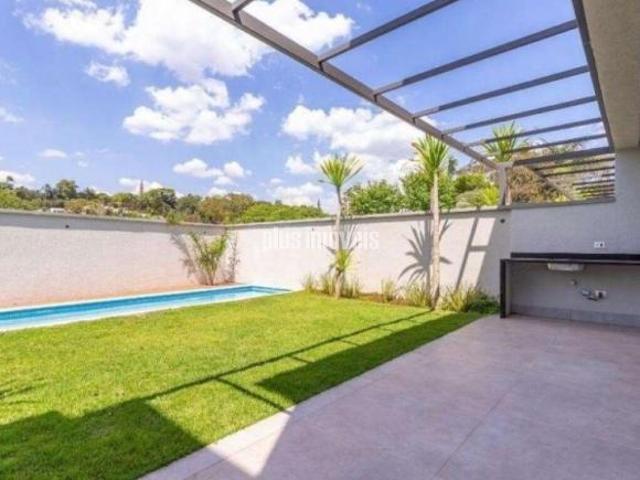 CASA EM CONDOMÍNIO 424.0M² ÁREA PRIVATIVA, 4 SUÍTES 4 GARAGEM QUINTAL COM PISCINA