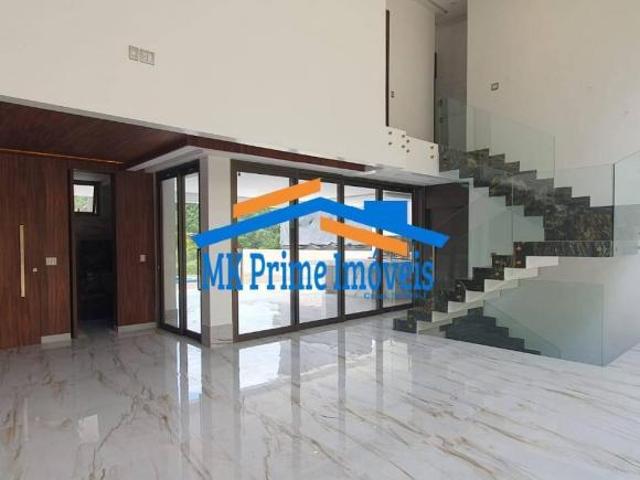 Casa em condomínio 496m² com 4 suítes no Residencial Tamboré 11
