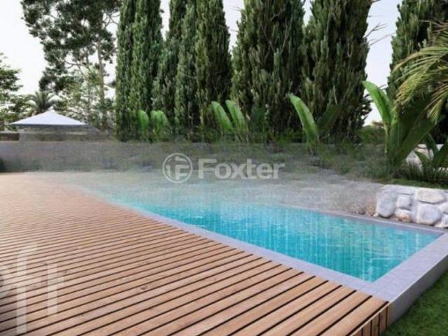 Casa em Condomínio, 4 dormitórios, 400 m², em Estância Velha