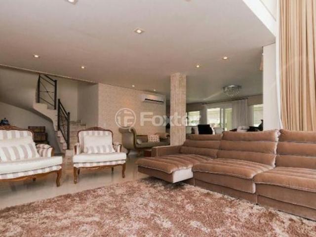 Casa em Condomínio, 4 dormitórios, 412 m², em Belém Novo