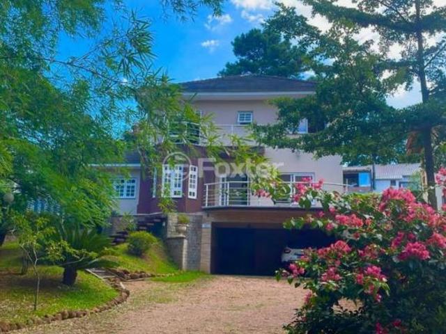 Casa em Condomínio, 4 dormitórios, 310 m², em Tarumã