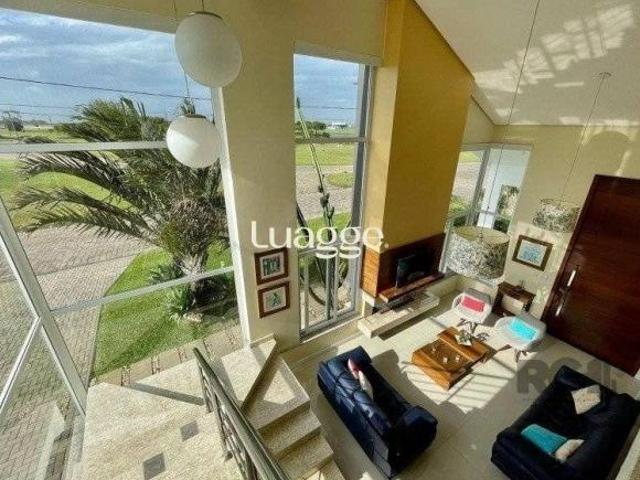 Casa em Condomínio 4 dormitórios à venda Atlântida Sul Osório/RS