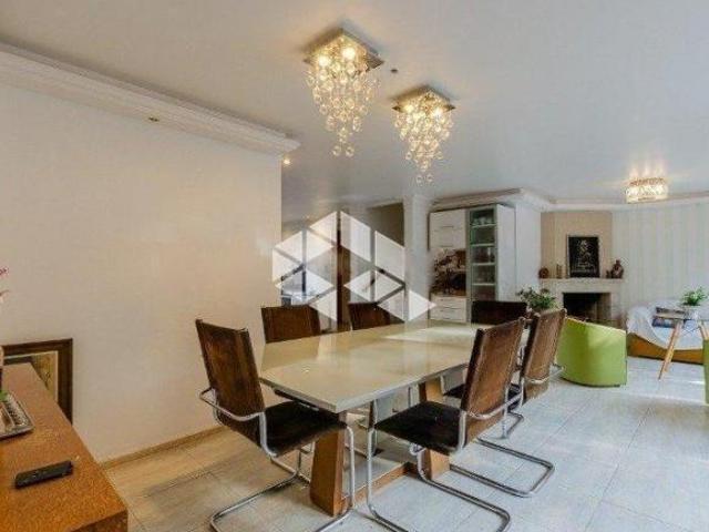 CASA EM CONDOMÍNIO 4 QUAERTOS E 2 VAGAS DE GARAGEM NO BAIRRO JARDIM ISABEL