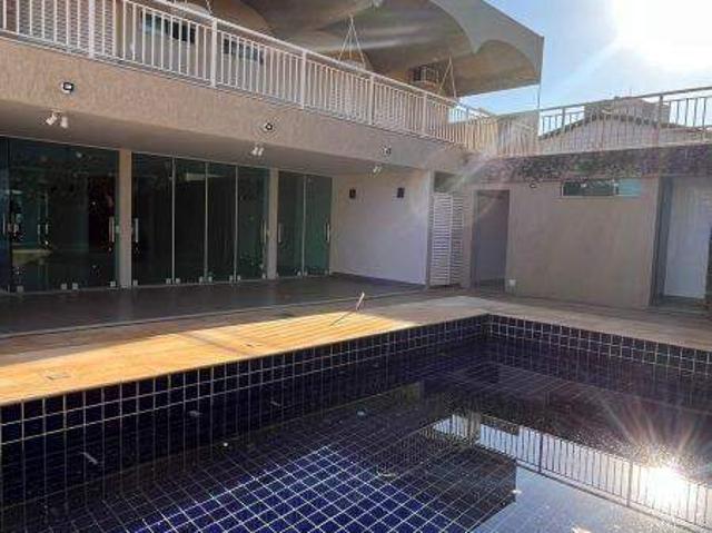 CASA EM CONDOMINIO. 4 SUÍTES. 4 VAGAS. PORTARIA 24H