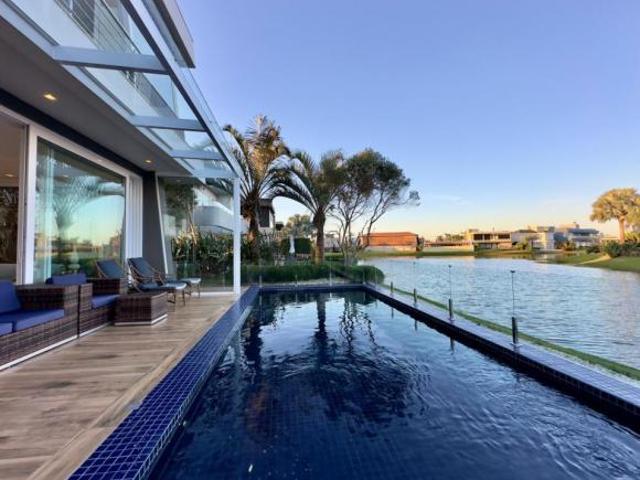 Casa em Condominio 5 dormitorios Bairro Atlantida