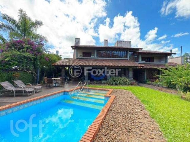 Casa em Condomínio, 6 dormitórios, 600 m², em Cavalhada