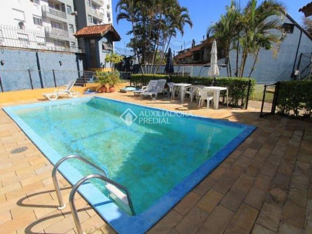 Casa em Condomínio com infra, 3 quartos suite, lareira e churrasqueira, garagem 2 carros