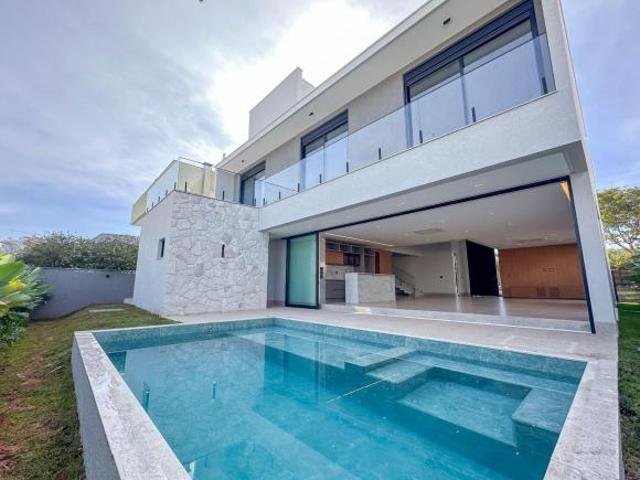 Casa em condomínio com 05 suítes, 414m² à venda no Alphaville Araguaia Goiânia GO
