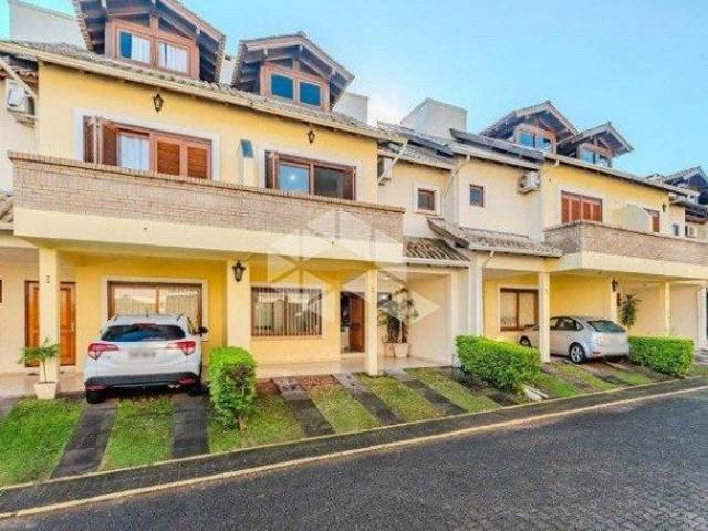 Casa em Condomínio com 192m² e 3 dormitórios e 2 vagas no bairro Ipanema, junto ao Shopping Verde