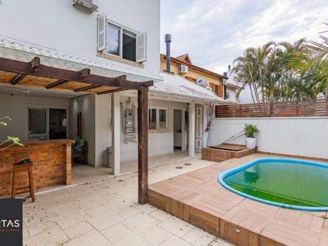 Casa em condomínio com 242m2 no bairro Ecoville
