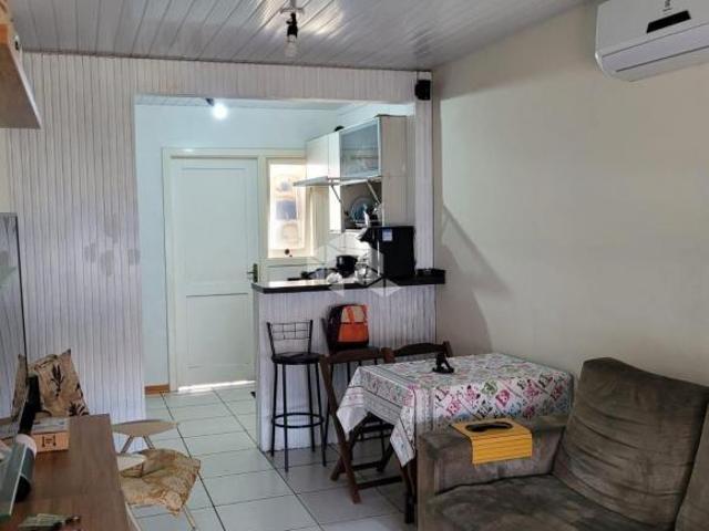 Casa em condominio, com 2 dormitórios, 2 vagas, no bairro Hípica