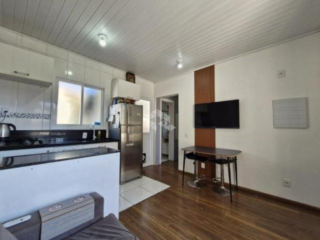 Casa em condomínio com 2 dormitórios, 42 m² e 1 vaga de garagem no bairro Niterói em Canoas/ RS