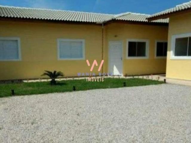 Casa em condomínio com 2 dormitórios à venda, 47m² por R$320.000 Balneário dos Golfinhos Caragua