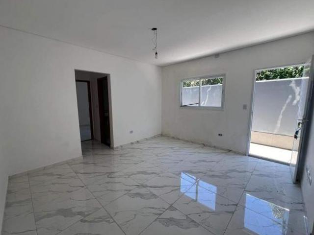 Casa em Condomínio com 2 dormitórios à venda, 67 m² por R$ 380.000 Tude Bastos Praia Grande/SP