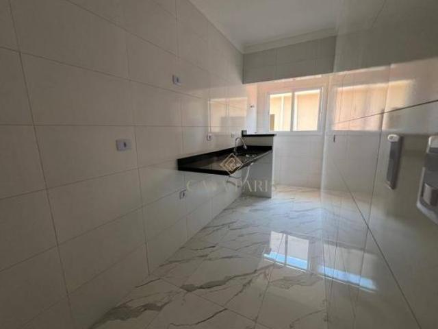 Casa em Condomínio com 2 dormitórios à venda, 68 m² por R$ 350.000 Tude Bastos Praia Grande/SP