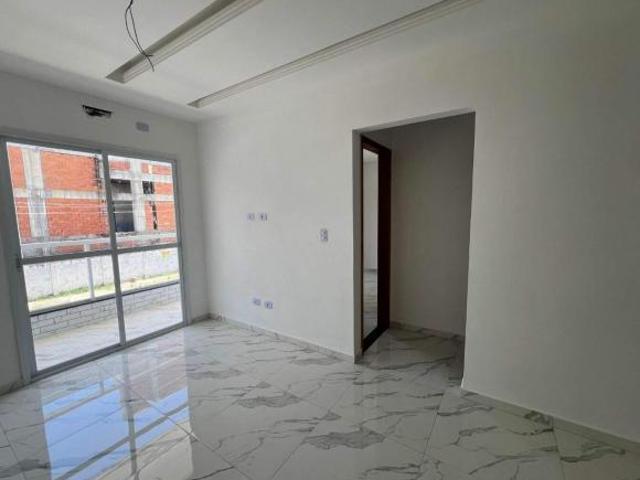 Casa em Condomínio com 2 dormitórios à venda, 72 m² por R$ 380.000 Tude Bastos Praia Grande/SP