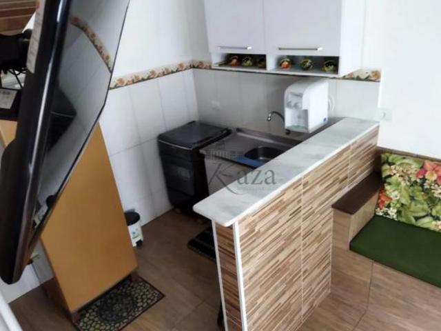 Casa em condomínio com 2 dormitórios e churrasqueira em Martim de Sá | Caraguatatuba