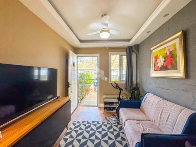 Casa em condomínio com 2 dormitórios no bairro São Luiz em Canoas aceita financiamento bancário e