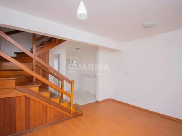 Casa em condomínio com 2 dormitórios, sendo 1 suíte, e 1 vaga de garagem no bairro Humaitá COD: 21170