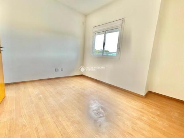 Casa em condomínio com 2 suítes no bairro Vila Nova