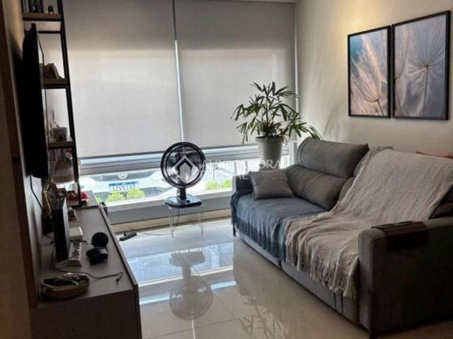Casa em condomínio com 2 quartos suítes no bairro Mário Quintana