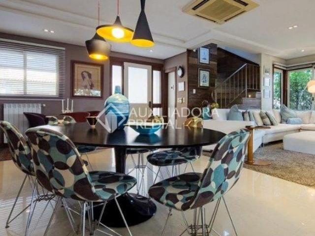 Casa em Condomínio com 380m², 4 dormitórios no bairro Tristeza