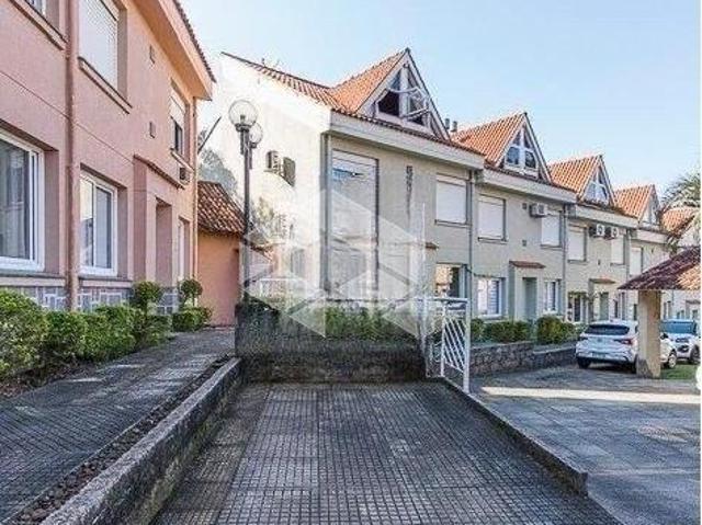 Casa em condomínio com 3 dormitórios, 1 suite e 2 vagas