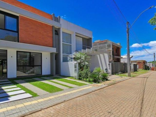 Casa em condomínio com 3 dormitórios 2 vagas no bairro Jansen e Gravatai