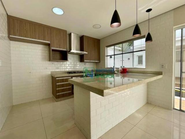 Casa em condomínio com 3 dormitórios à venda, 215 m² por R$ 1.250.000