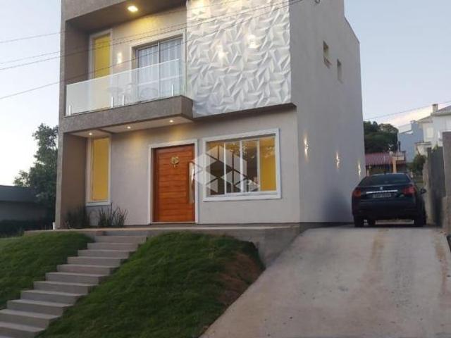 Casa em condominio com 3 dormitórios em Gravatai