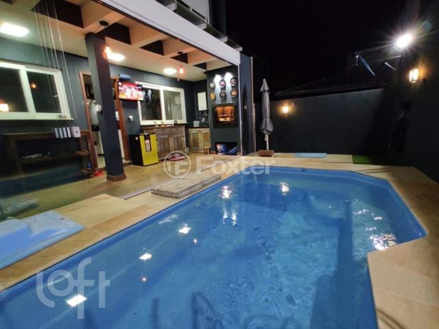 Casa em Condomínio com 3 dormitórios em Porto Alegre