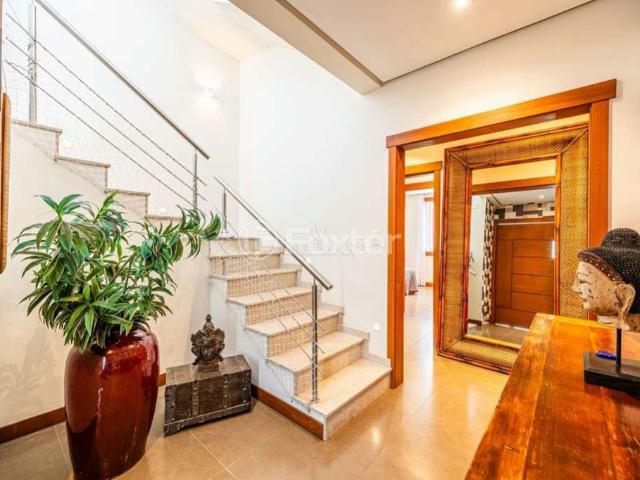 Casa em Condomínio com 3 dormitórios em Porto Alegre