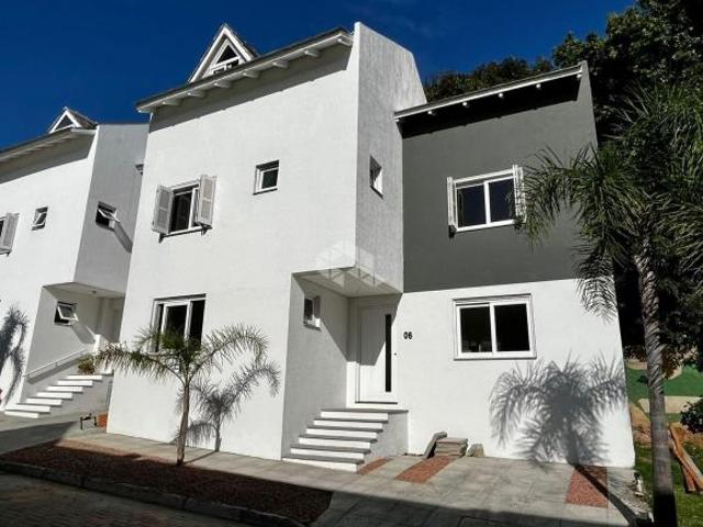 Casa em condomínio com 3 dormitórios, suíte e 2 vagas no bairro Vila Nova / Cavalhada