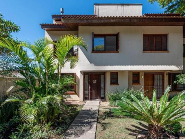Casa em condomínio com 3 dormitórios, suíte e 2 vagas
