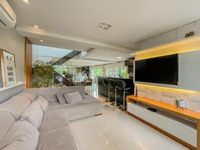 Casa em condomínio com 3 suítes no bairro Ipanema